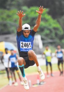 Action from the Junior National Athletics Championships – The Island