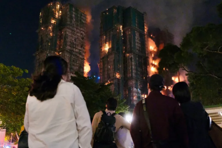 Death toll in fire at Hong Kong high-rise residential buildings rises ...